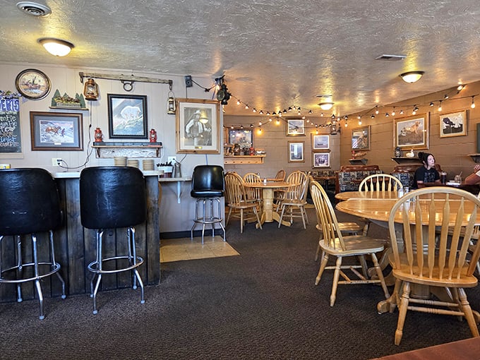 Inside, wooden Windsor chairs and twinkling string lights create that perfect small-town diner ambiance where conversations flow as freely as the coffee.