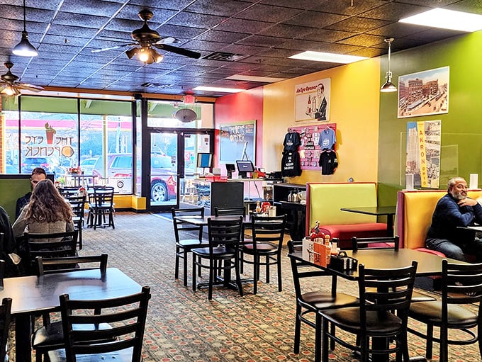 Vibrant yellow and green walls create the perfect backdrop for serious breakfast contemplation—a colorful canvas for culinary masterpieces.