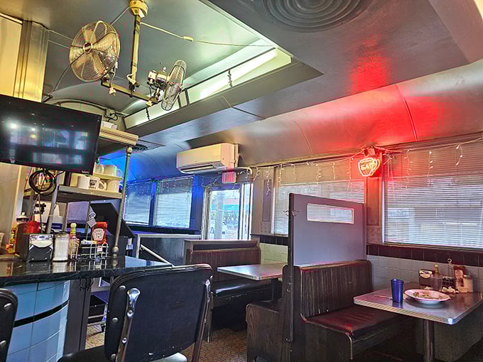Inside, the curved ceiling and vintage booths transport you to a simpler time when conversations happened face-to-face and coffee refills were unlimited.
