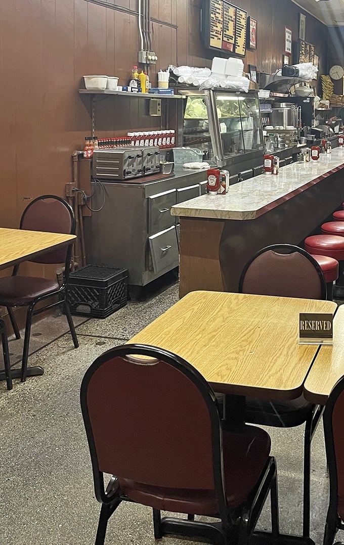 Inside Duly's, time stands wonderfully still. The counter, stools, and no-nonsense tables aren't trying to impress anyone—they're too busy supporting great food.