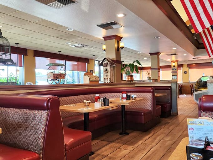 Classic red vinyl booths and warm wood tones create that "where everybody knows your name" vibe. Comfort begins before the food even arrives.