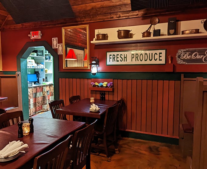Wooden paneling meets vintage cookware in this cozy dining room where the "Fresh Produce" sign isn't just decoration—it's a delicious promise kept.