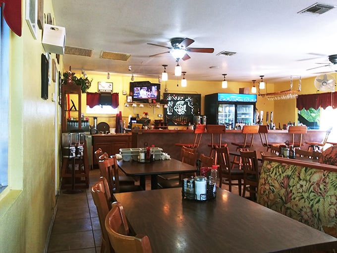 Inside, the warm yellow walls and wooden furnishings create that "everybody knows your name" vibe that's increasingly rare in our chain restaurant world.