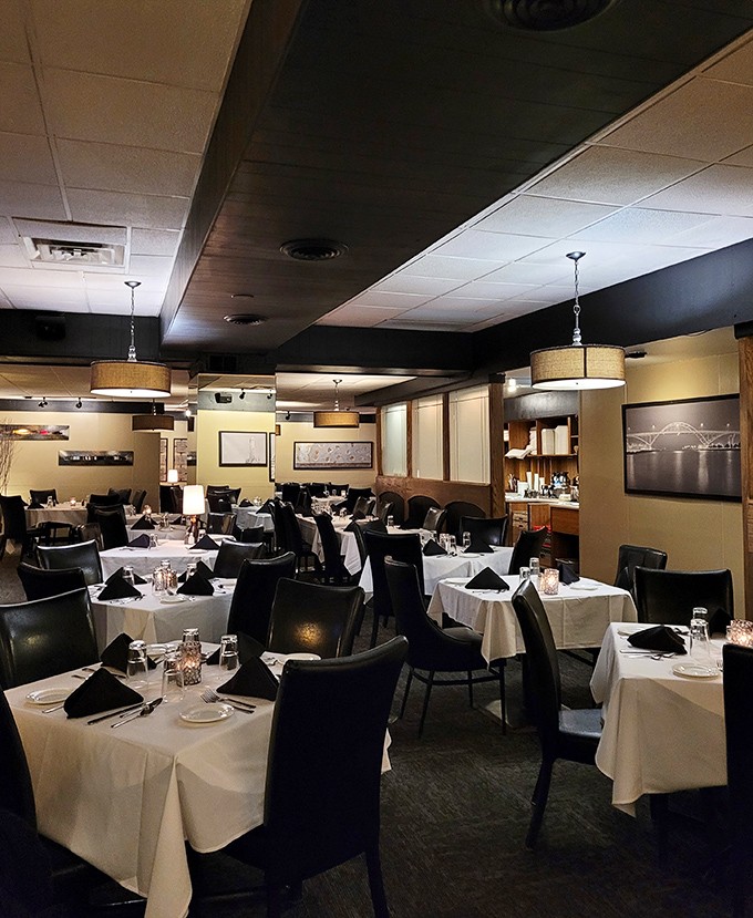 White tablecloths and warm lighting create the perfect backdrop for memorable meals and even better conversations.