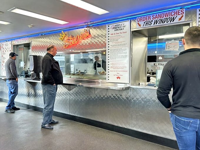 The gleaming stainless steel counter—where dreams are ordered, magic is made, and diets go to die gloriously.
