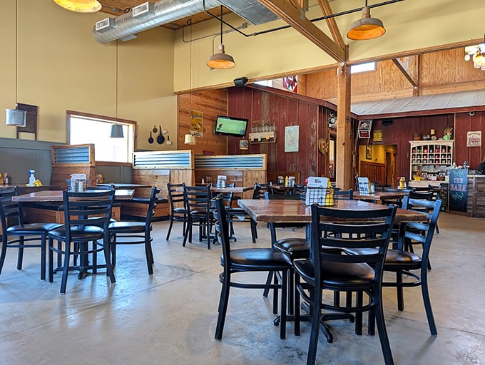 Rustic wooden beams meet modern comfort inside The Barn, where every table feels like the best seat in the house.