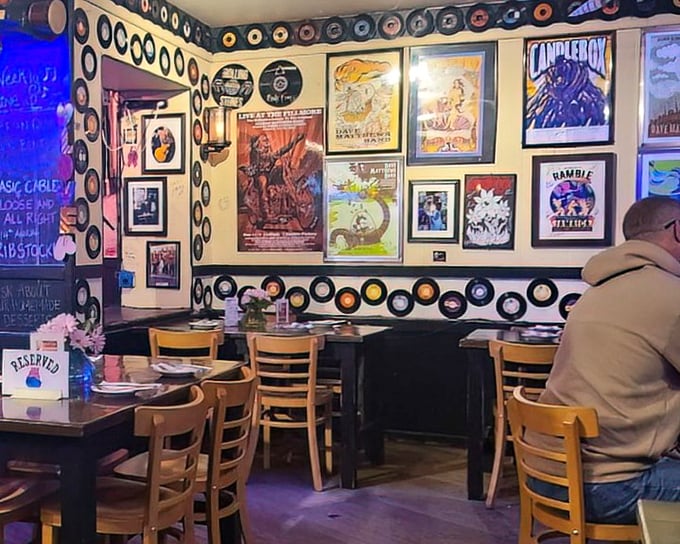 Vinyl heaven meets barbecue paradise – where your eyes feast on music history while your stomach plans its attack.