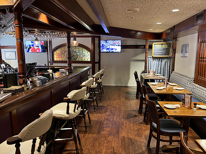 Polished wood, comfortable bar seating, and stained glass accents create that perfect "just off the harbor" atmosphere you crave.