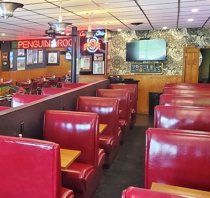 Those red booths have heard more stories than a bartender's diary – each one better than the last.
