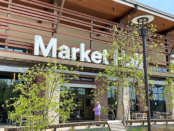 The Market Hall beckons hungry shoppers with its modern design and promise of sustenance—because nobody makes good purchasing decisions on an empty stomach.