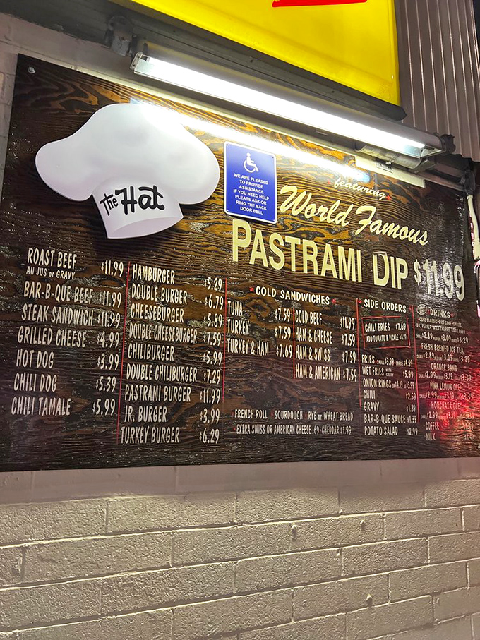 This menu board isn't just a list of options—it's a roadmap to happiness where the World Famous Pastrami Dip reigns supreme.