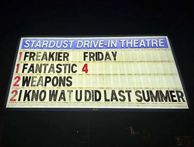 The iconic blue and yellow marquee announces tonight's double features—where else can you get four movies for the price of one night out?