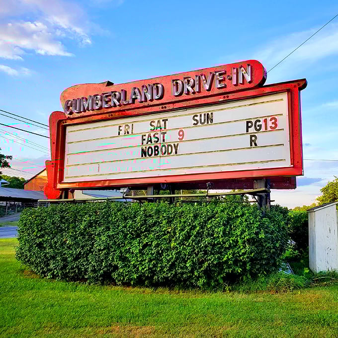 That iconic red marquee announces tonight's features, a beacon of entertainment that's been drawing movie lovers to Newville for generations.