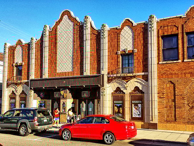 The ornate façade of Monroe's historic theater stands as a testament to a time when buildings weren't just structures, but works of art.