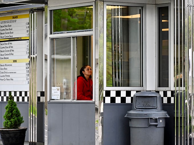 The order window becomes your portal to drive-in bliss, where friendly faces make every meal feel like coming home.