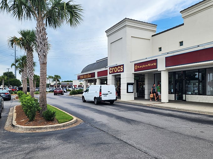 Florida's architectural charm meets discount shopping heaven. Even the palm trees seem to whisper, "Your credit card is about to have quite the adventure."