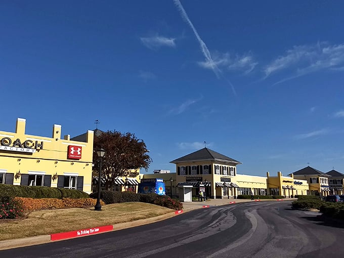 Under the bright South Carolina sky, Coach and Under Armour stores stand side-by-side—proof that both your workout gear and weekend bag can be equally discounted.