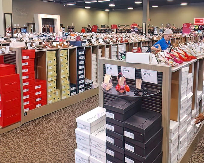 Shoe heaven isn't a myth—it's organized by size and discount percentage. This treasure trove makes Cinderella's fairy godmother look inefficient.