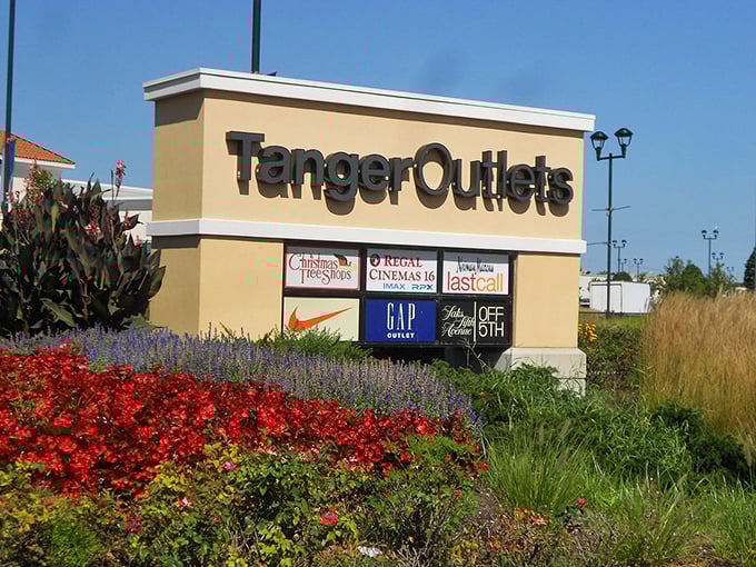 Not just a sign, but a promise of retail therapy. Those colorful flowers aren't just pretty—they're celebrating your future savings. 