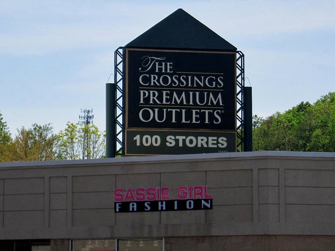 The sign doesn't lie—100 stores of retail therapy await, with Sassie Girl Fashion just one stop on this marathon shopping adventure.