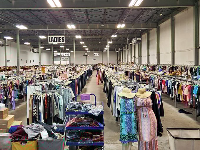 Rows of clothing stretch endlessly like a fabric rainbow, promising fashion adventures for every budget and style preference.