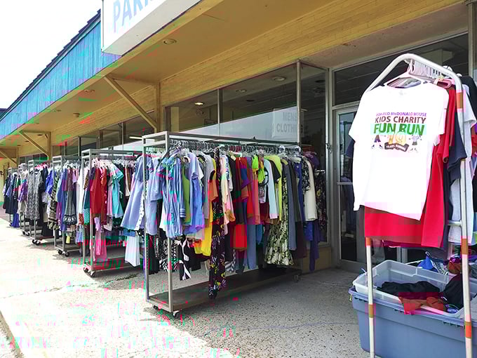 Sidewalk shopping at its finest! These rolling racks of neatly organized clothing offer the first taste of the thrifting adventure that awaits. 