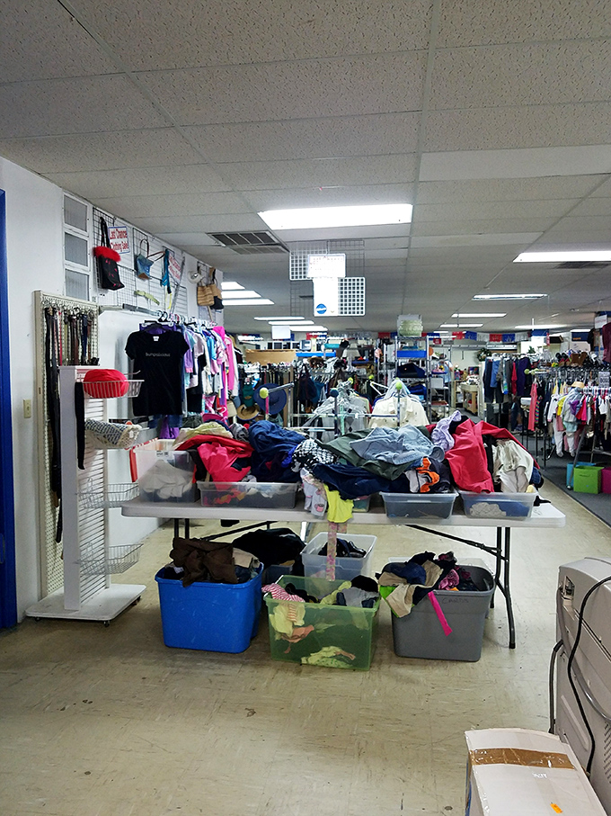 Organized chaos at its finest—racks of potential wardrobe upgrades await shoppers brave enough to dig for that perfect hidden gem.
