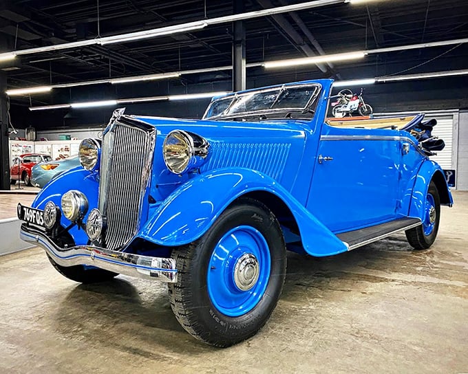 This electric blue 1930s convertible isn't just a car—it's a time machine with whitewalls, ready to transport you to an era when driving was an occasion worthy of your best hat.