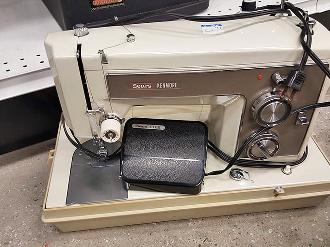 This vintage Sears Kenmore sewing machine isn't just appliance—it's a time capsule. Grandma's exact model waiting for its second act in someone's crafting renaissance.