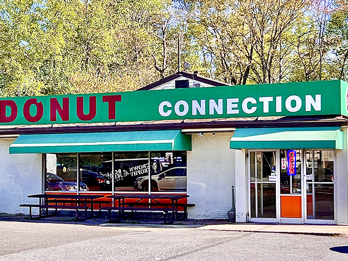 The green awning beckons like a beacon of hope for anyone craving serious donut satisfaction.