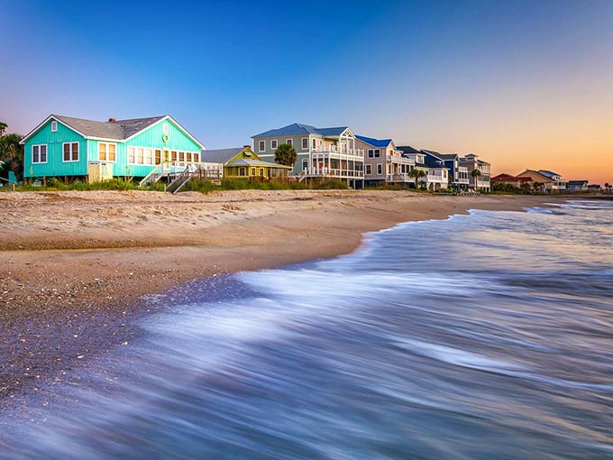 Edisto Beach houses line up like colorful beach umbrellas, each one whispering stories of lazy summer days.