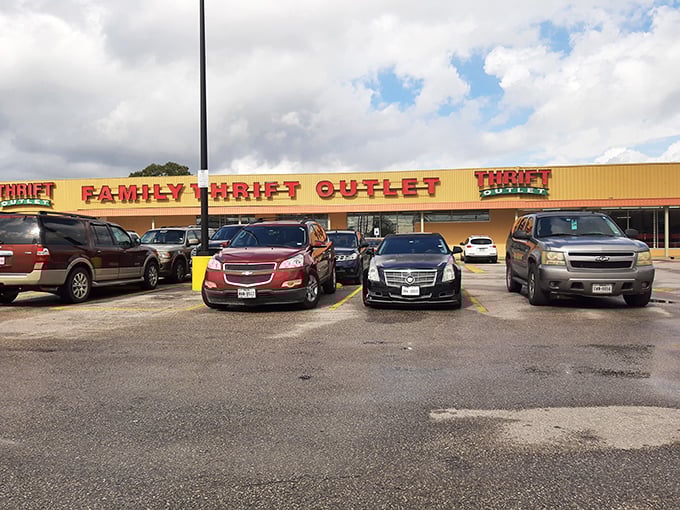Family Thrift Center Outlet's bright yellow sign shines like a beacon for bargain hunters. The parking lot's full—always a good sign!