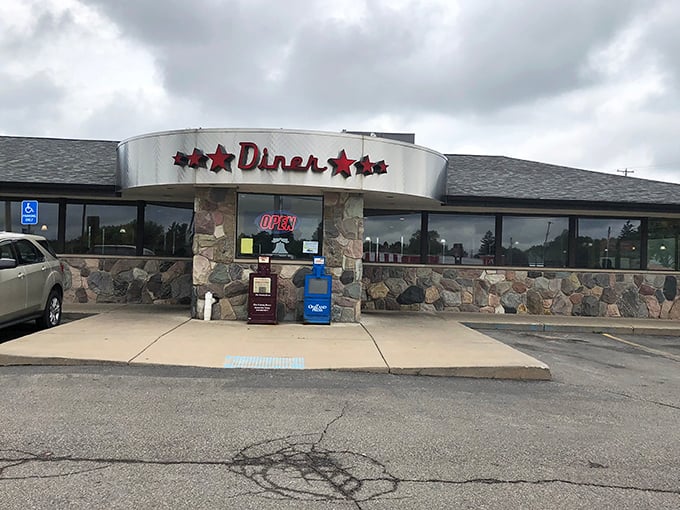 Flag City Diner's stone facade and red star signage—where patriotism meets pancakes in perfect harmony.