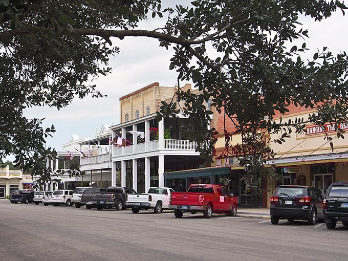 Step into Goliad's town square where history whispers from every weathered storefront and time moves like honey.