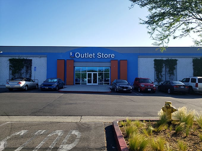 Goodwill's blue warehouse exterior hints at the colorful treasures waiting inside for savvy shoppers to discover.