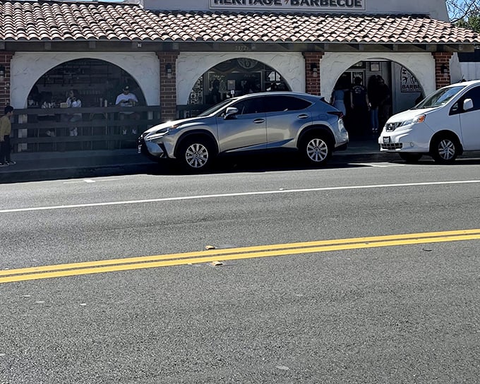 Strip mall magic happens here, where Spanish tiles meet serious BBQ dreams.