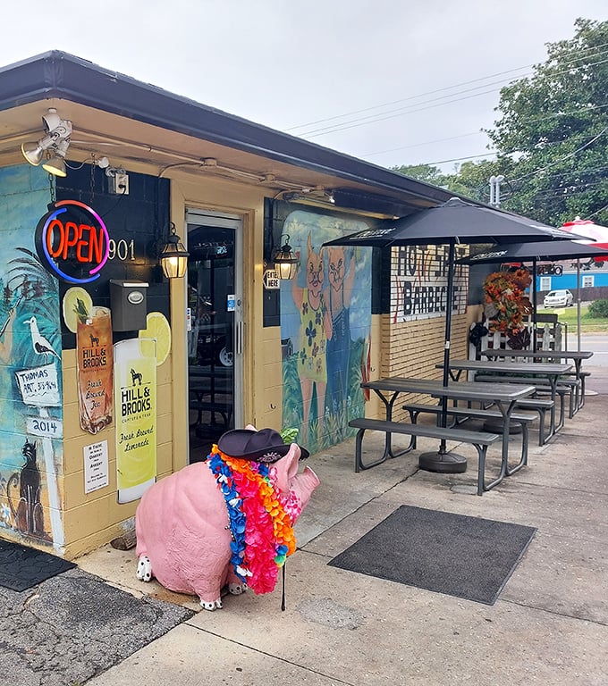 That pink pig in a lei perfectly captures the fun-loving spirit of Pensacola's most cheerful smokehouse.