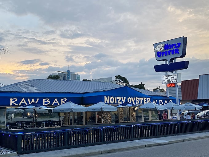 That bright blue exterior practically shouts "fresh seafood inside" louder than a fisherman's morning call.