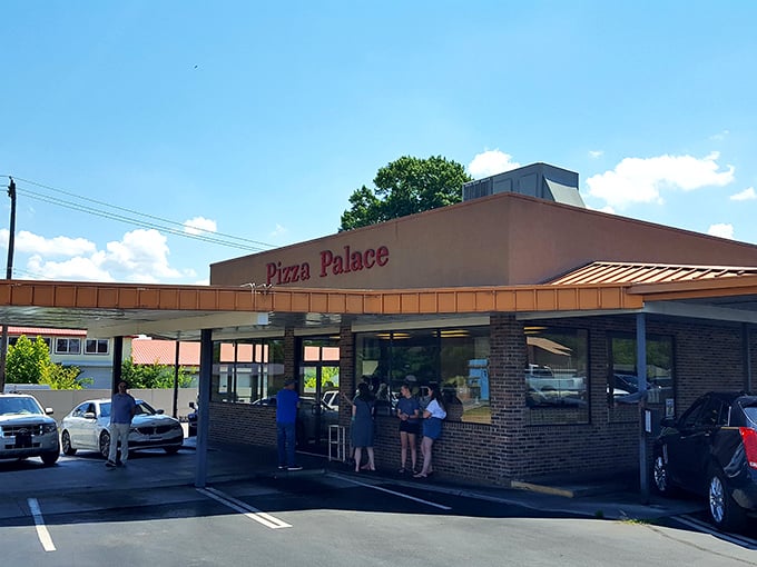 Pizza Palace's retro charm hasn't changed since your first crush. This Knoxville institution keeps the drive-in dream alive.