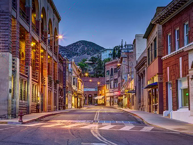 Historic Main Street stretches toward mountain silhouettes like a scene from "Tombstone."