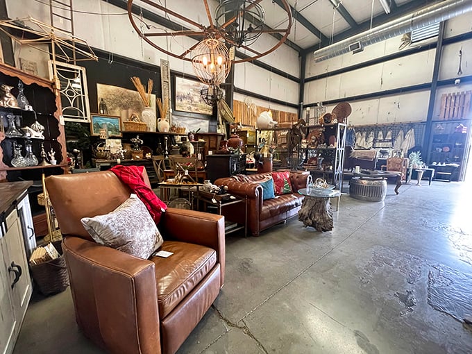 Industrial chic meets treasure hunter's paradise – where leather chairs wait for their next living room adventure.