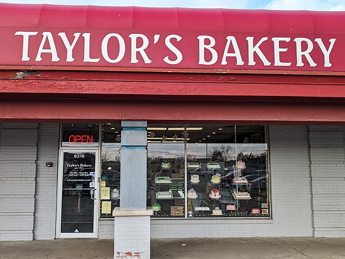Behind that cheerful red awning lies a neighborhood treasure that's been sweetening mornings for decades.