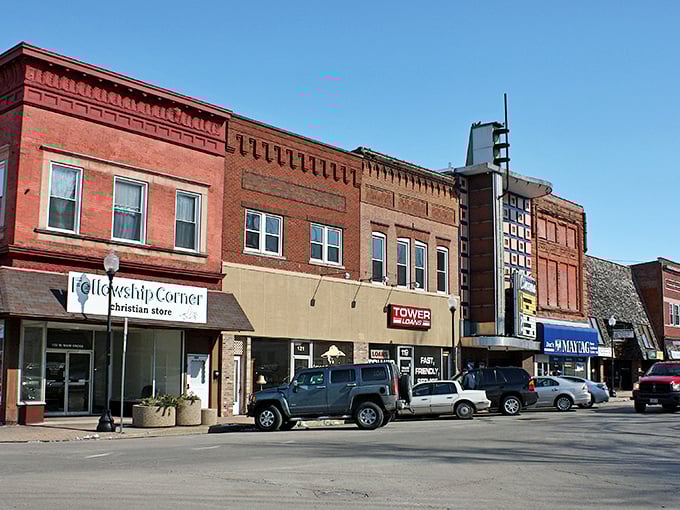 A row of weathered shops where every window feels like it could hide the town’s best pie recipe.