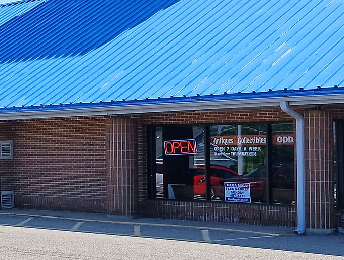 The bright blue roof signals serious antique business - Michigan's most unique shopping destination awaits.