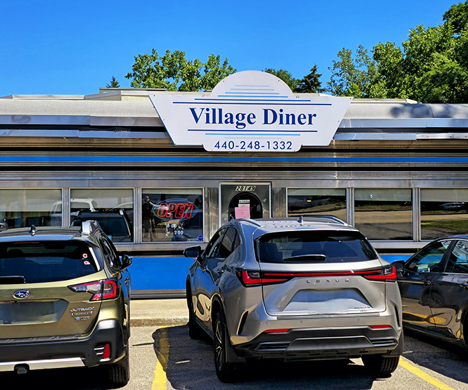 Blue-striped and chrome-kissed, Village Diner gleams in the Ohio sunshine like a time machine ready to transport you to an era when calories didn't count.