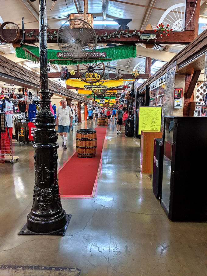 These ornate lamp posts guide shoppers through aisles packed tighter than a holiday suitcase.