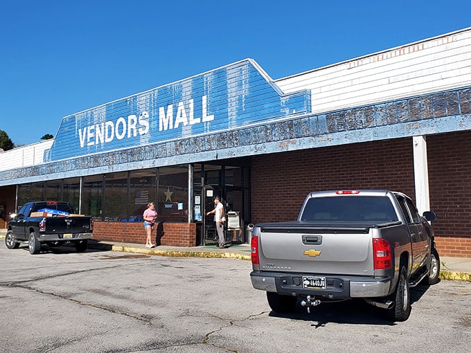 The iconic blue storefront of Vendors Mall stands like a portal to bargain dimension. Even Clark Kent would skip the phone booth for this transformation opportunity!