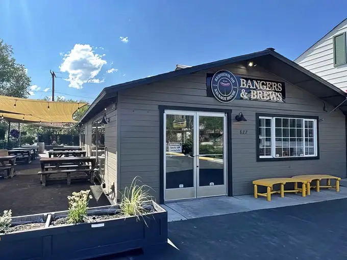The patio beckons with promises of perfectly grilled bangers and ice-cold brews under Oregon's endless blue skies.