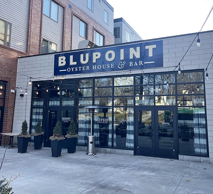 Modern meets maritime at Blue Point's sleek entrance. Those glass doors are portals to seafood heaven in the heart of Cleveland.