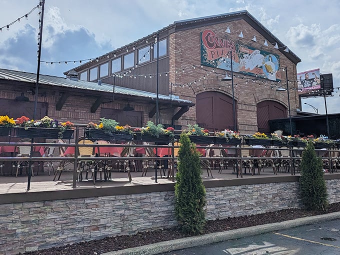 This patio setup whispers "stay awhile" – exactly what great pizza places should do.